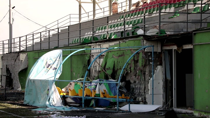National Post | Ukrainian Kids Play Soccer In Bombed-Out Stadium