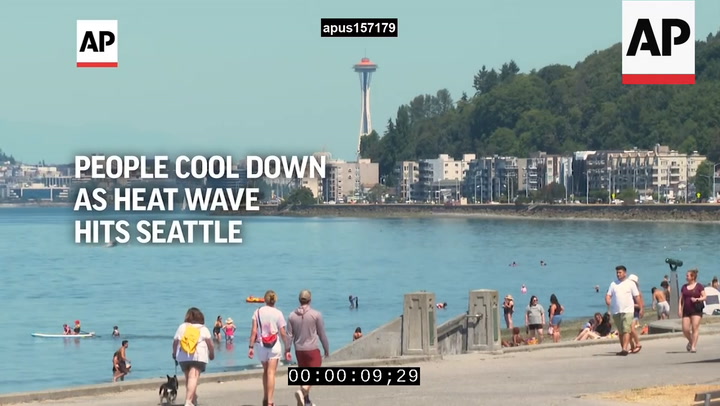 National Post | People Cool Down As Heat Wave Hits Seattle
