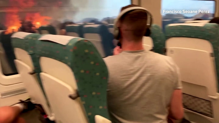 National Post | Passengers Look On As Wildfire Rages Near Stuck Train