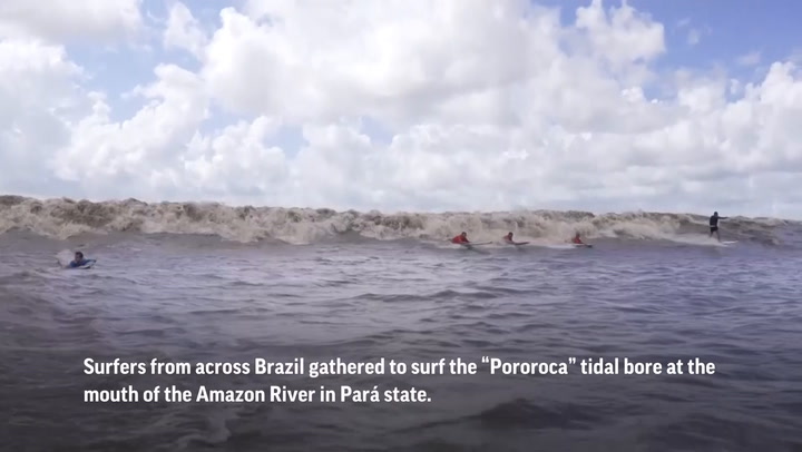 National Post | Surfers Ride Amazon Tidal Wave On Full Moon