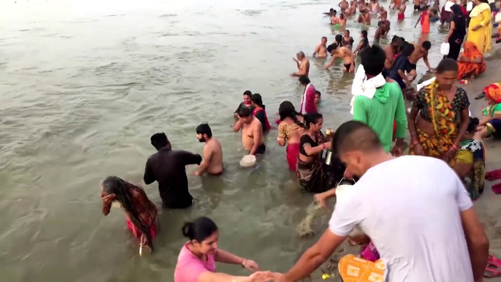 National Post | Indian Devotees Mark No Moon Monday With River Dip