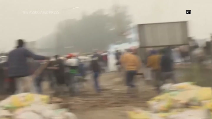 National Post | Police Use Tear Gas Against Indian Farmers Marching To ...