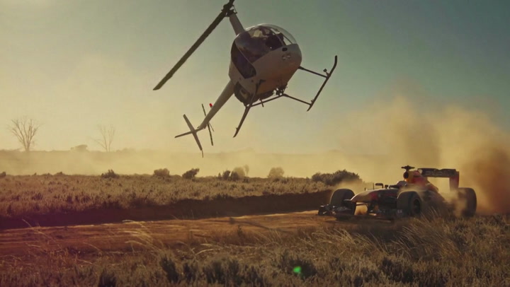 Driving | Daniel Ricciardo off-roads F1 car across the outback