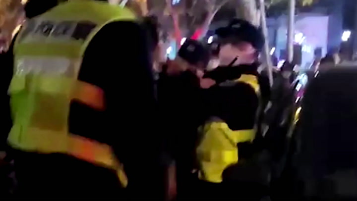 National Post | Shanghai Police Carry Away Demonstrator In Covid Protests