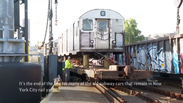 National Post | Goodbye: Old Subway Cars Float Away In Ny Harbor